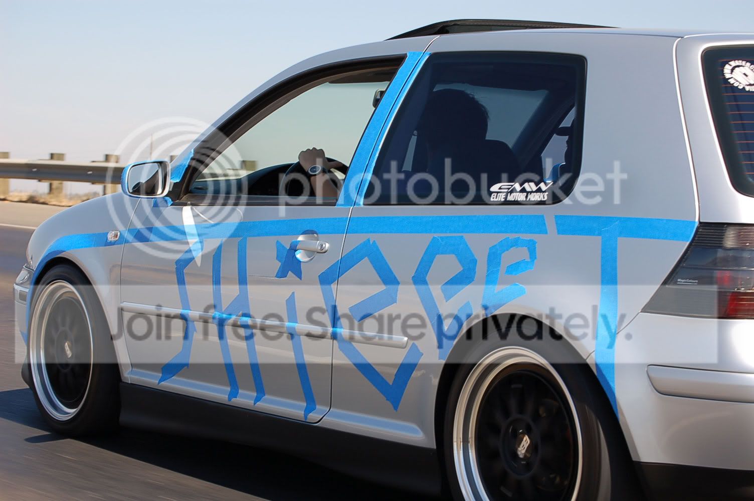 Textured body kit, rubstrips, and grill. If you look, I'll give you a ...